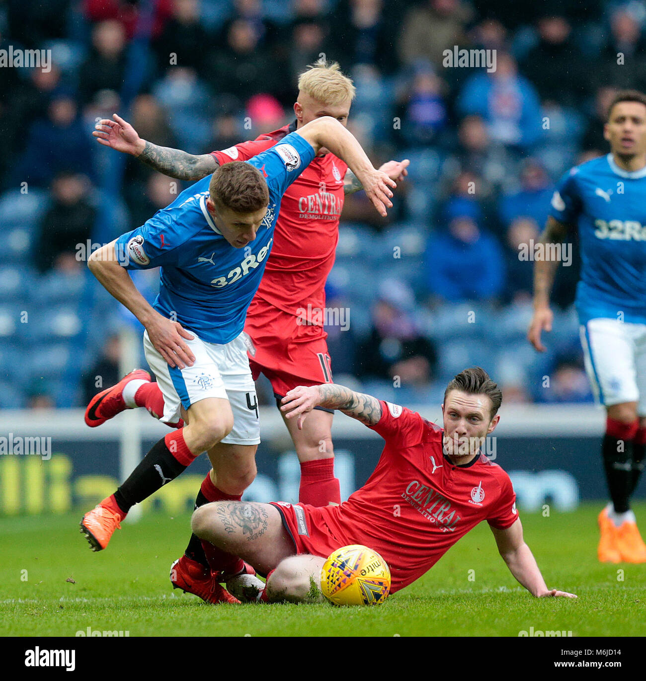 Rangers' Greg Docherty (left) and Falkirk's Jordan McGhee battle for ...