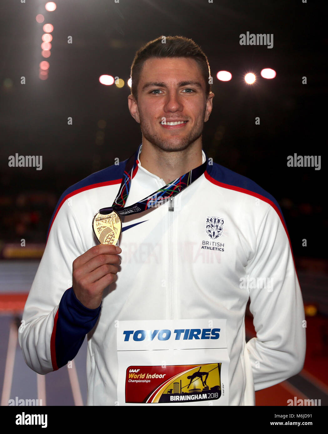 Great Britain's Andrew Pozzi poses with his gold medal after winning ...