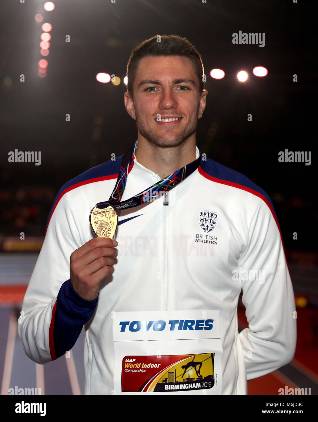 Great Britain's Andrew Pozzi poses with his gold medal after winning ...