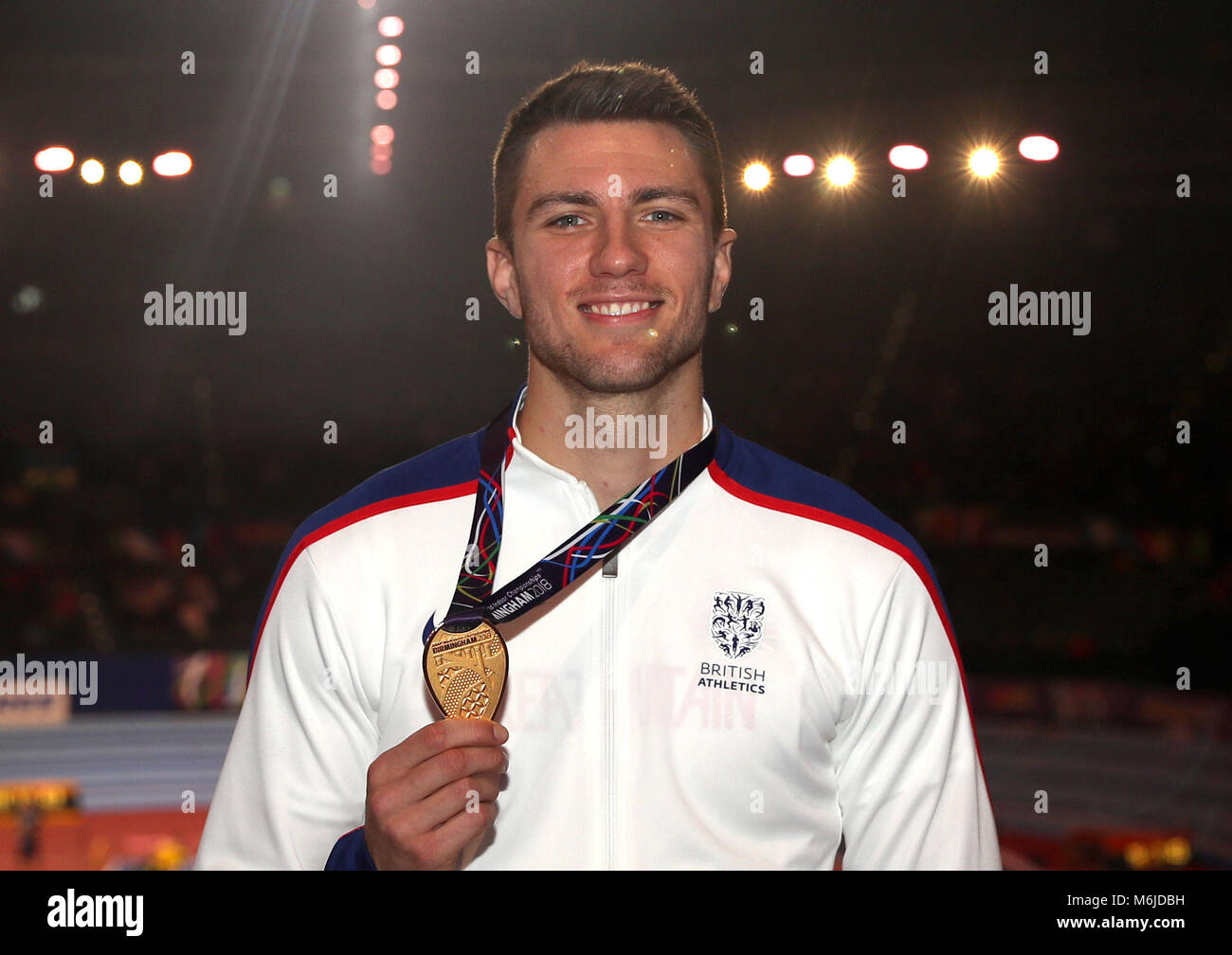 Great Britain's Andrew Pozzi poses with his gold medal after winning ...