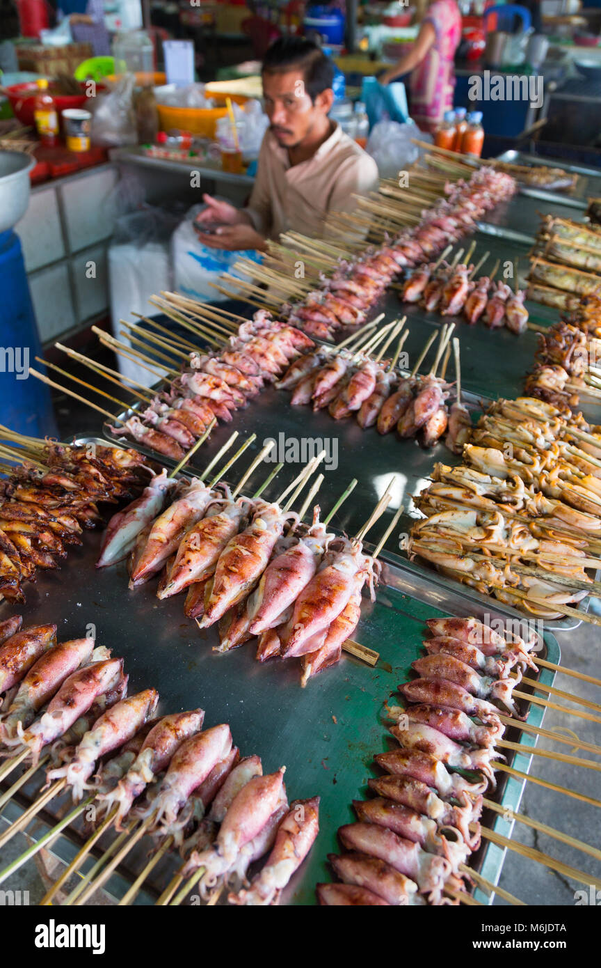 Stallholder and fish stall, Kep Crab Market, a mainly seafood market ...