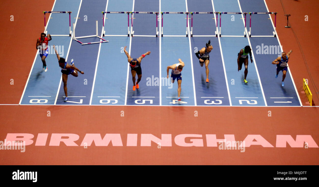 Athletes compete in the final of the Men's 60 metres hurdles during day ...