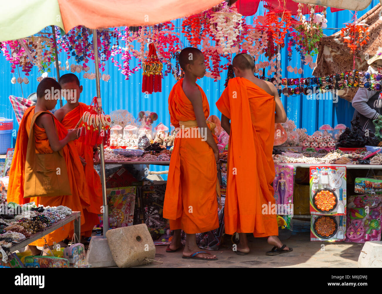 Young buddhist monks shopping at a market stall, Kep, Cambodia, Asia ...