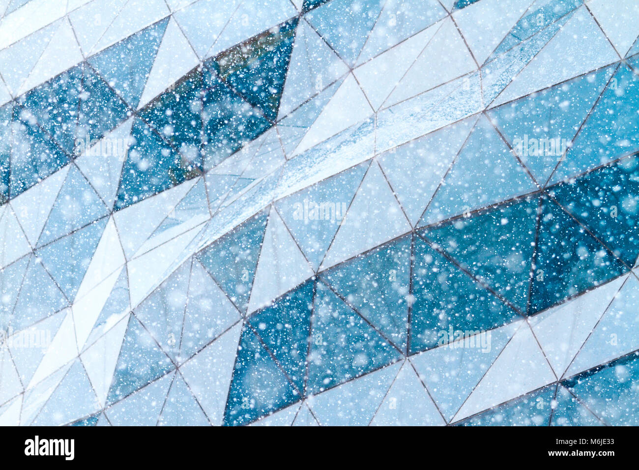 glass wall and snow flakes , design and weather conditions Stock Photo ...