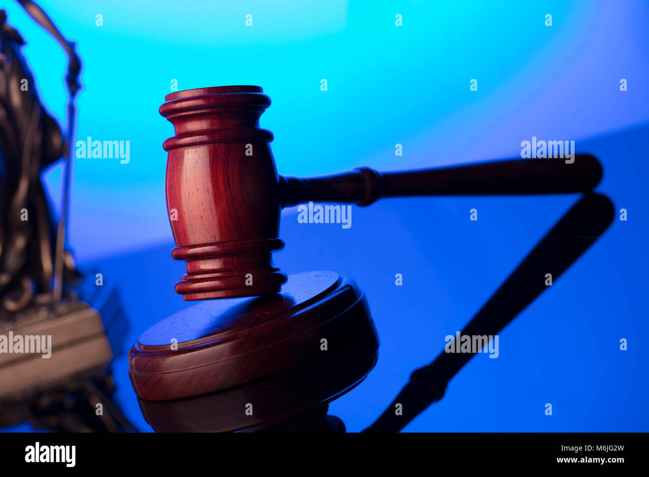 Lady of justice - Themis statue on blue background. Place for text ...