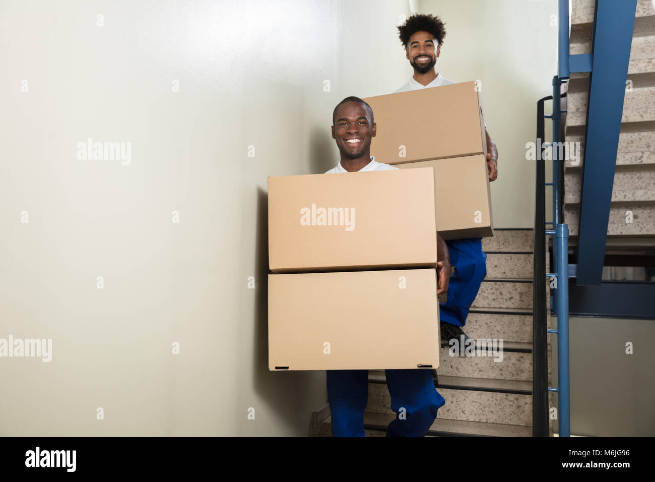 Man Carrying Boxes Stairs High Resolution Stock Photography and Images ...