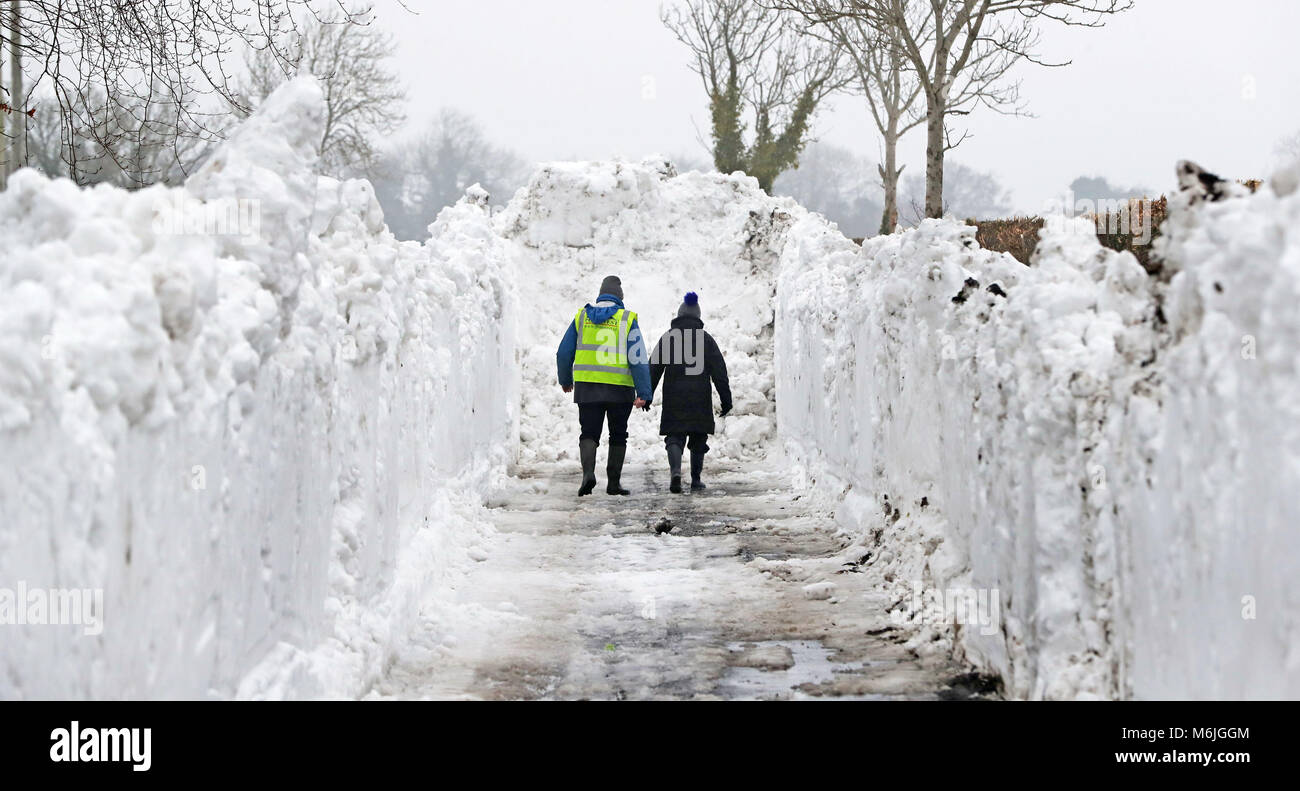 Brother and sister Seamus Ashe and Maureen Sammon look at a trench of ...