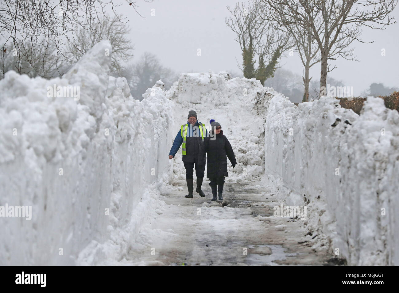 Brother and sister Seamus Ashe and Maureen Sammon look at a trench of ...