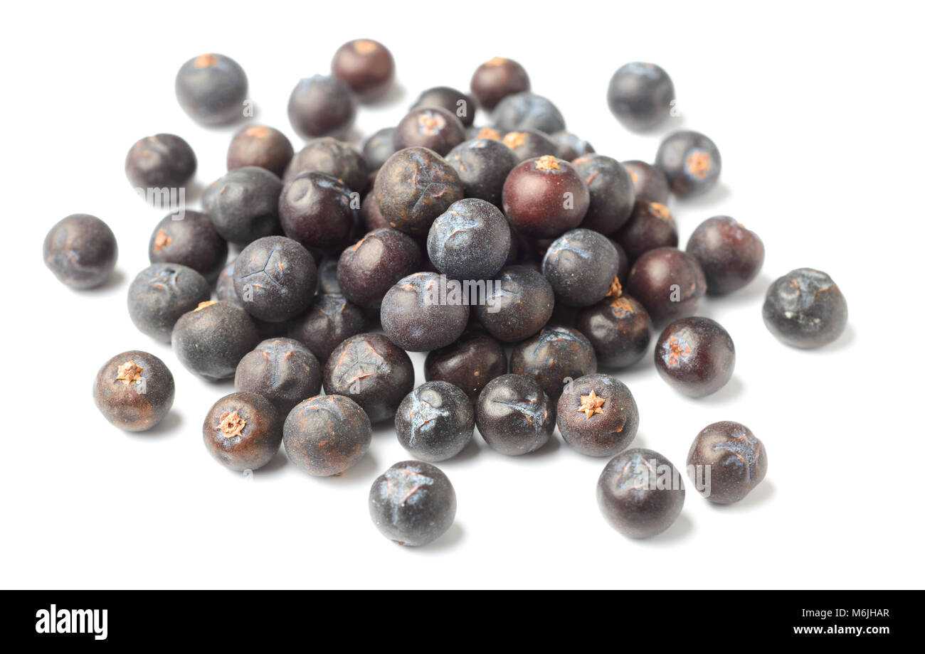 dried juniper berries isolated on white background Stock Photo - Alamy