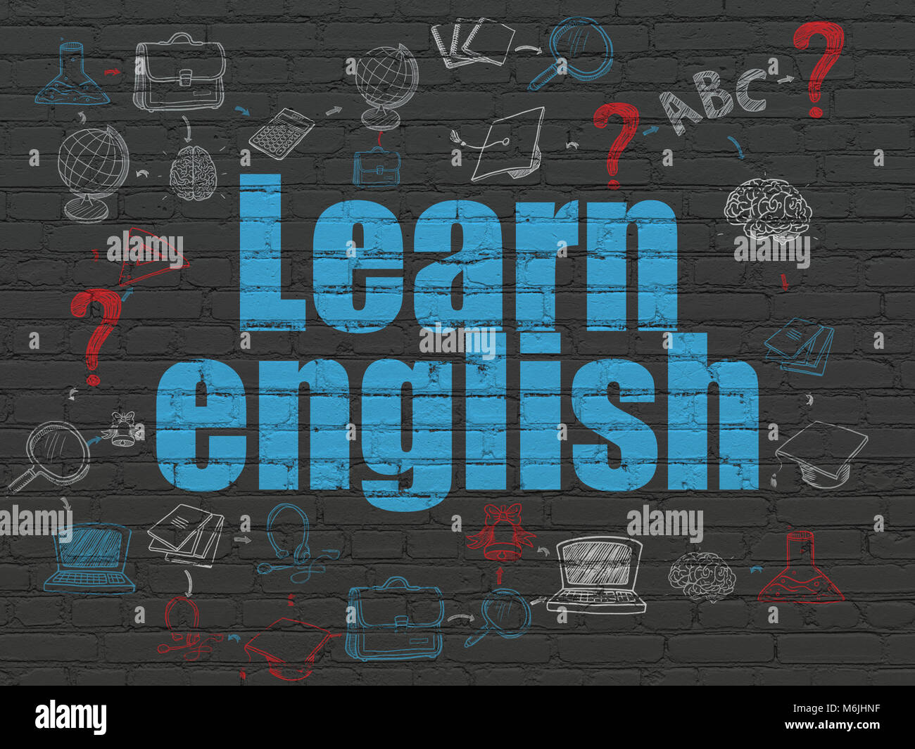 Studying concept: Learn English on wall background Stock Photo - Alamy