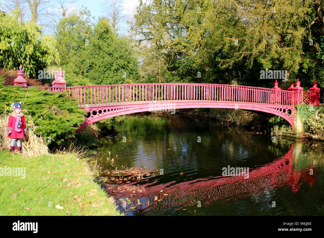 The red bridge spanning Sher Brook at Shugborough Hall Stock Photo - Alamy