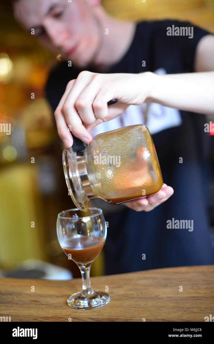 Barista, making coffee drink Stock Photo - Alamy