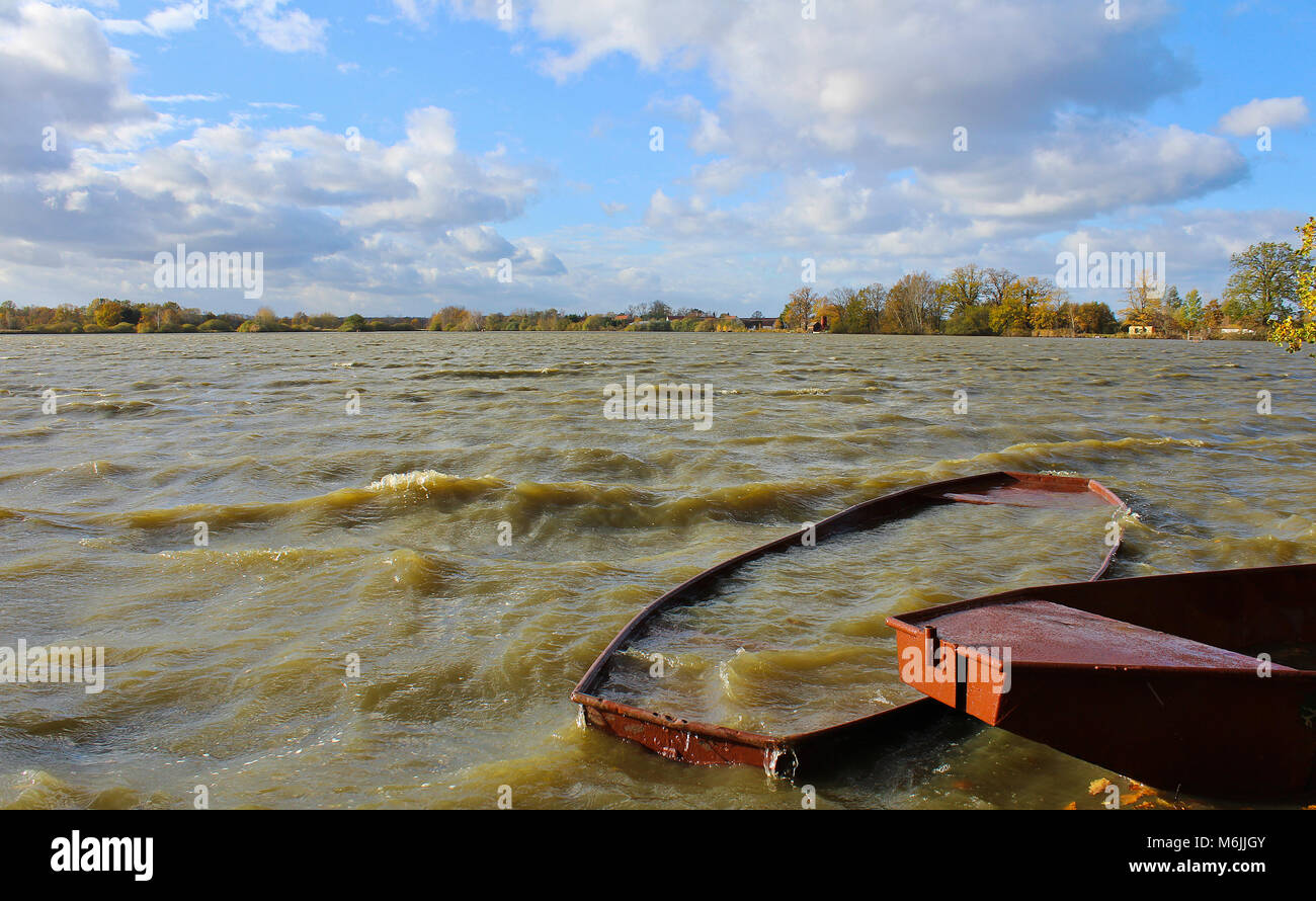Pond with big wave in strong wind with two boats. Czech landscape Stock ...