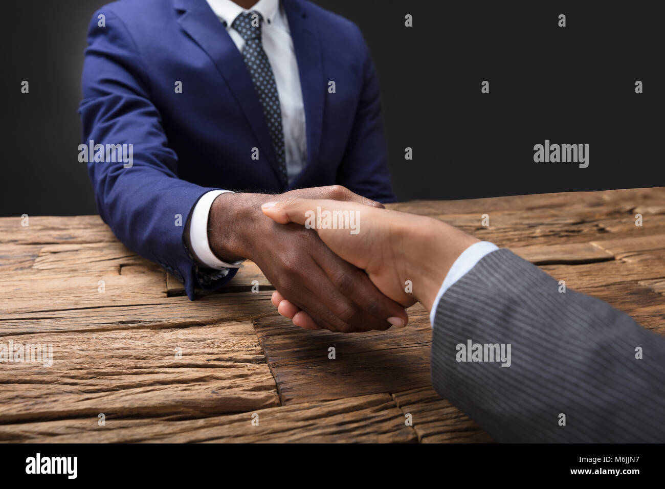 Close-up Of A Businessman's Hand Shaking Hand With His Partner Stock ...