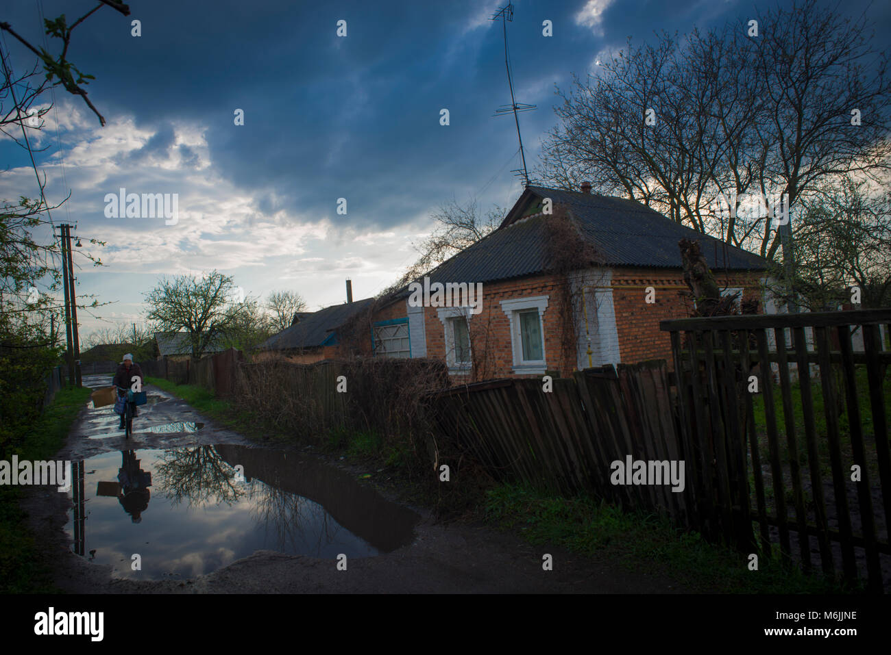 Ukraine, Romny. A side-street, with abandoned house Stock Photo - Alamy