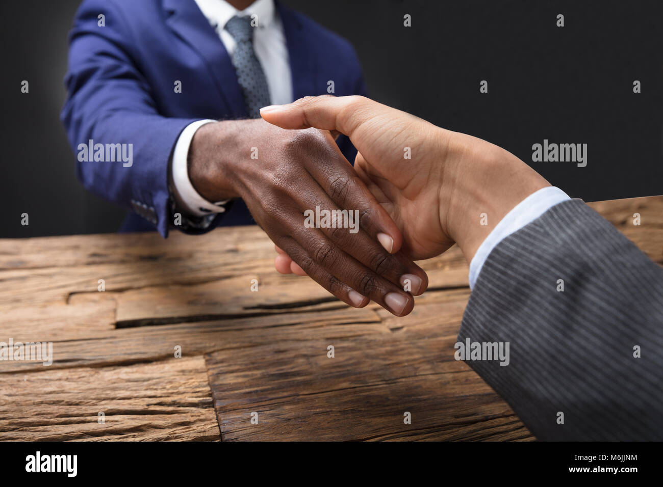 Close-up Of A Businessman's Hand Shaking Hand With His Partner Stock ...