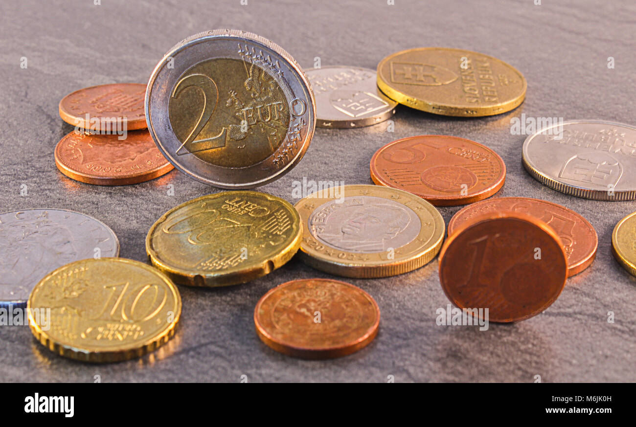 Euro coin with slovakia crown on stone background Stock Photo - Alamy