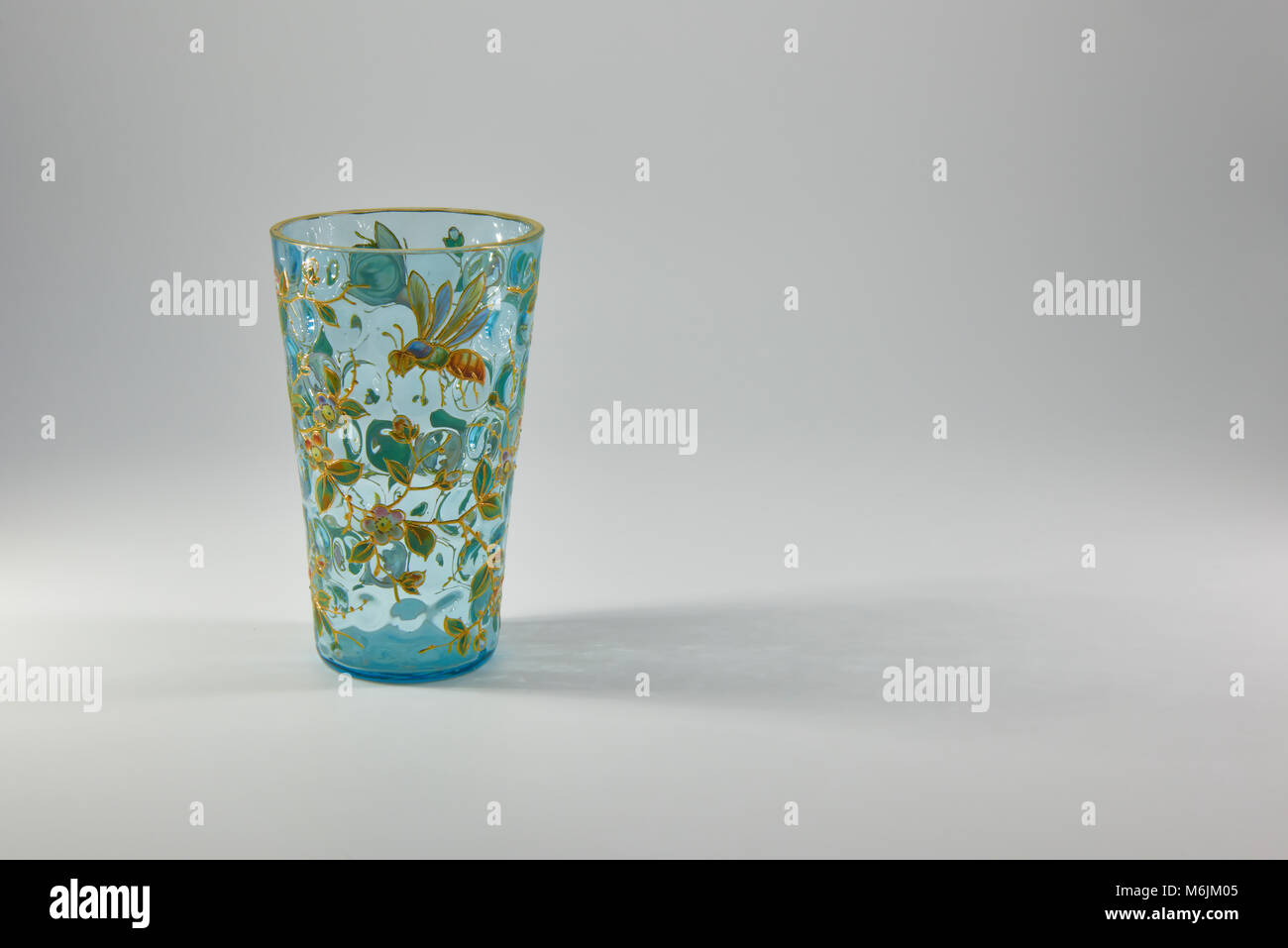 A 17th Century, Pale blue Glass Vase, embellished with an enamel of ...