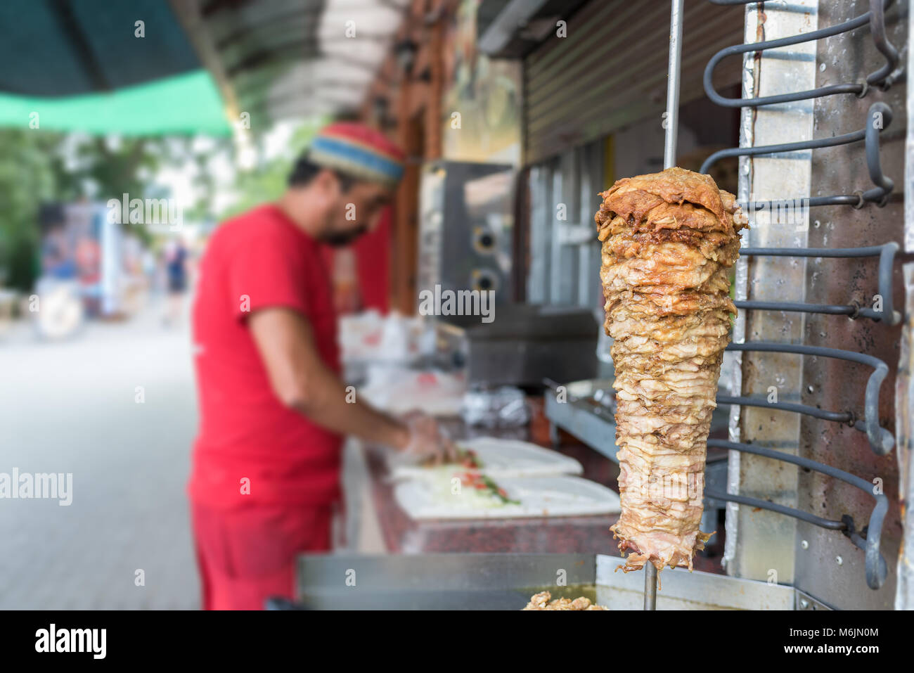 Cooking process of shawarma, traditional turkish meat, workflow closeup ...