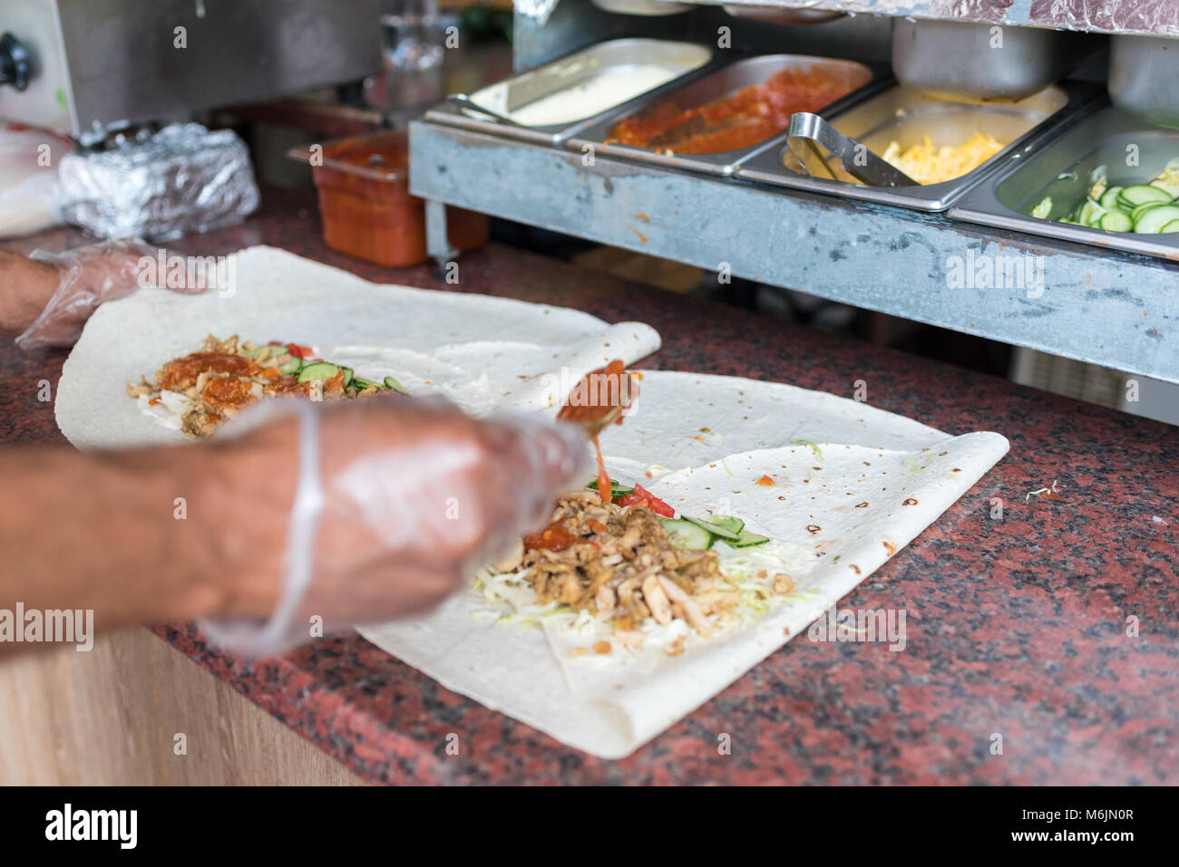 Cooking process of shawarma, traditional turkish meat, workflow closeup ...