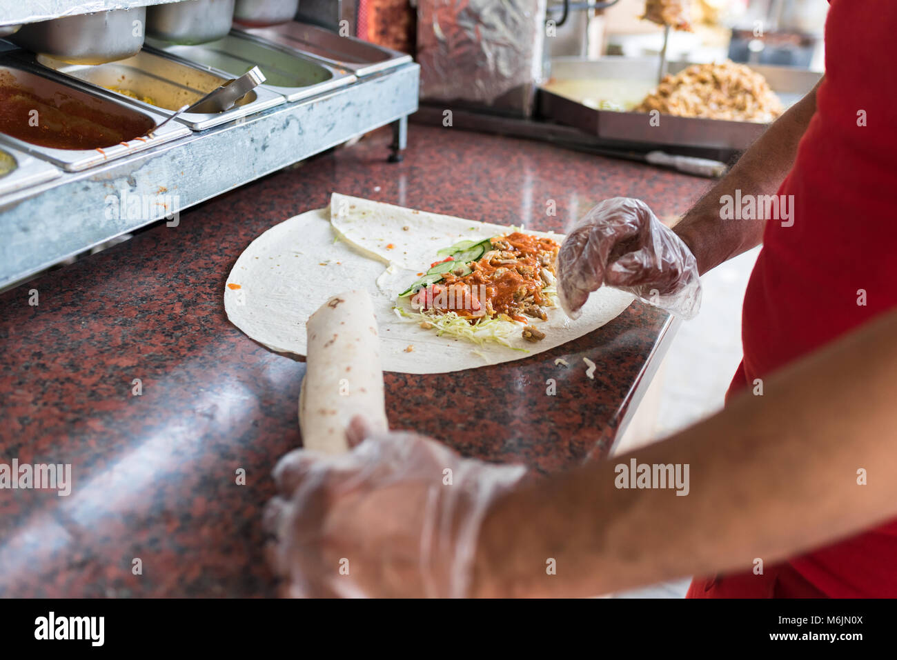 Cooking process of shawarma, traditional turkish meat, workflow closeup ...
