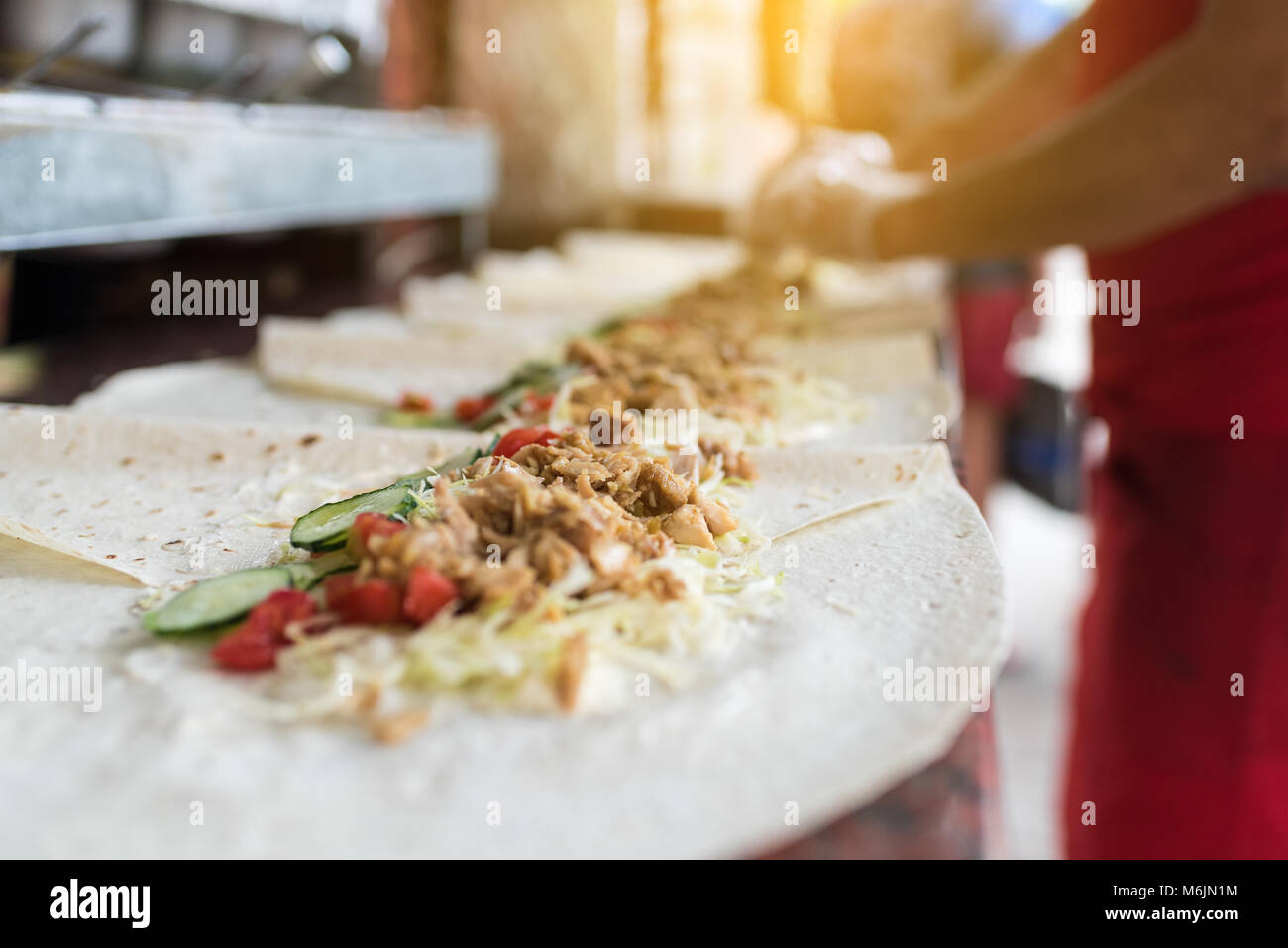 Cooking process of shawarma, traditional turkish meat, workflow closeup ...
