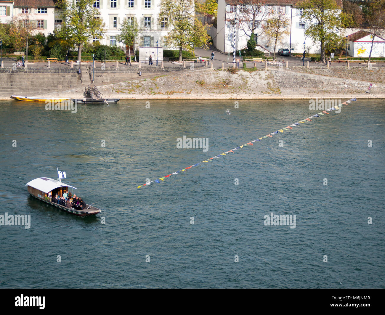 Crossing the Rhine river in Basel in the cable ferry Stock Photo - Alamy