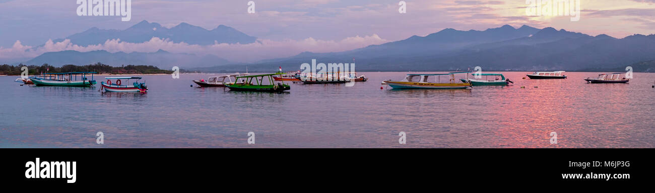 beautiful boats by sunset Stock Photo - Alamy