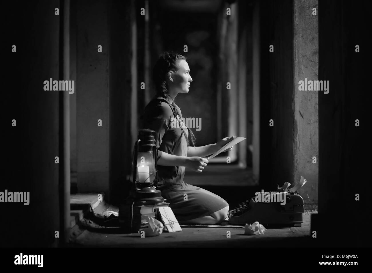 Retro girl in the old house reading books Stock Photo - Alamy