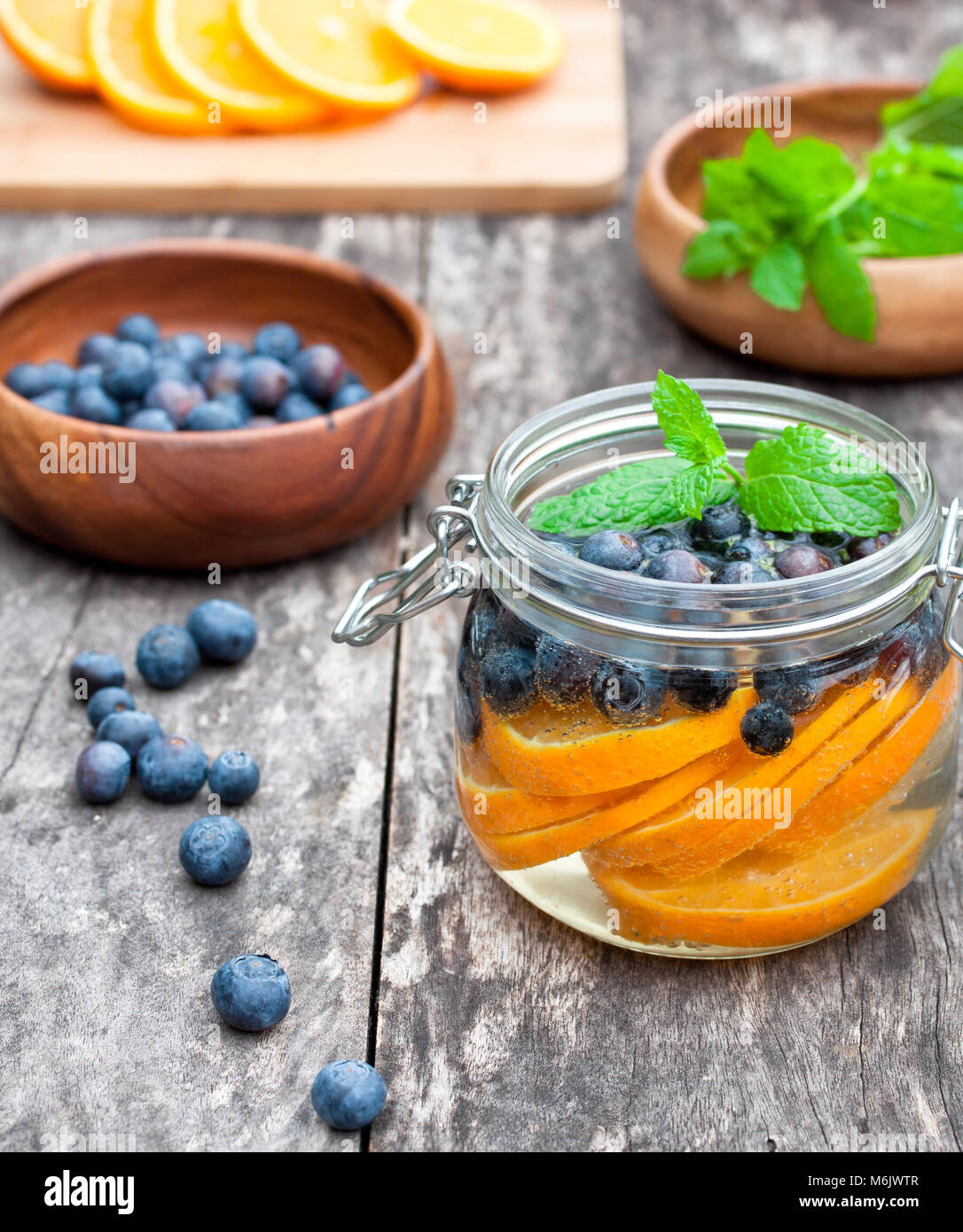 homemade fruit drink with berries oranges and mint Stock Photo - Alamy