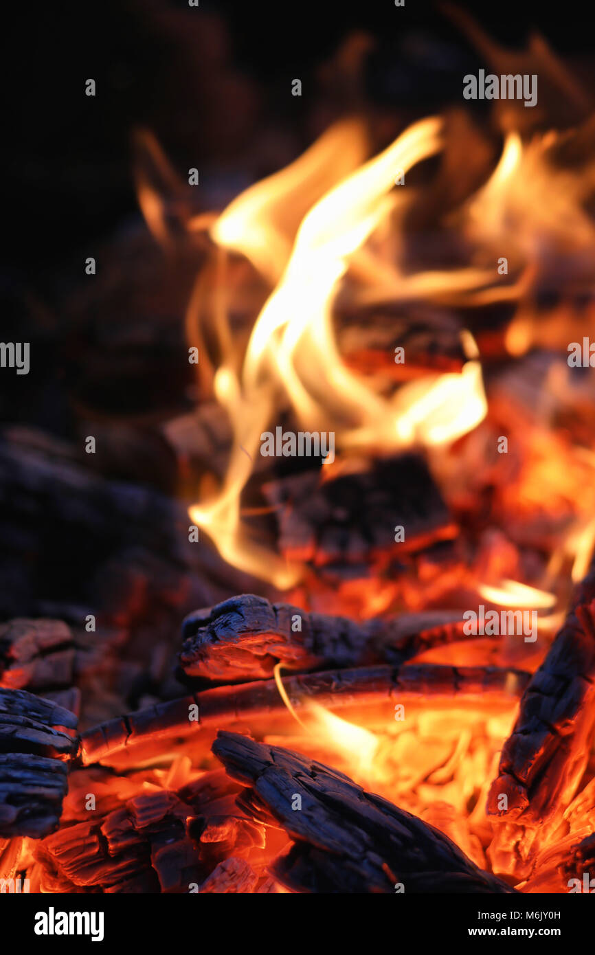Smoldering ashes of a bonfire Stock Photo - Alamy