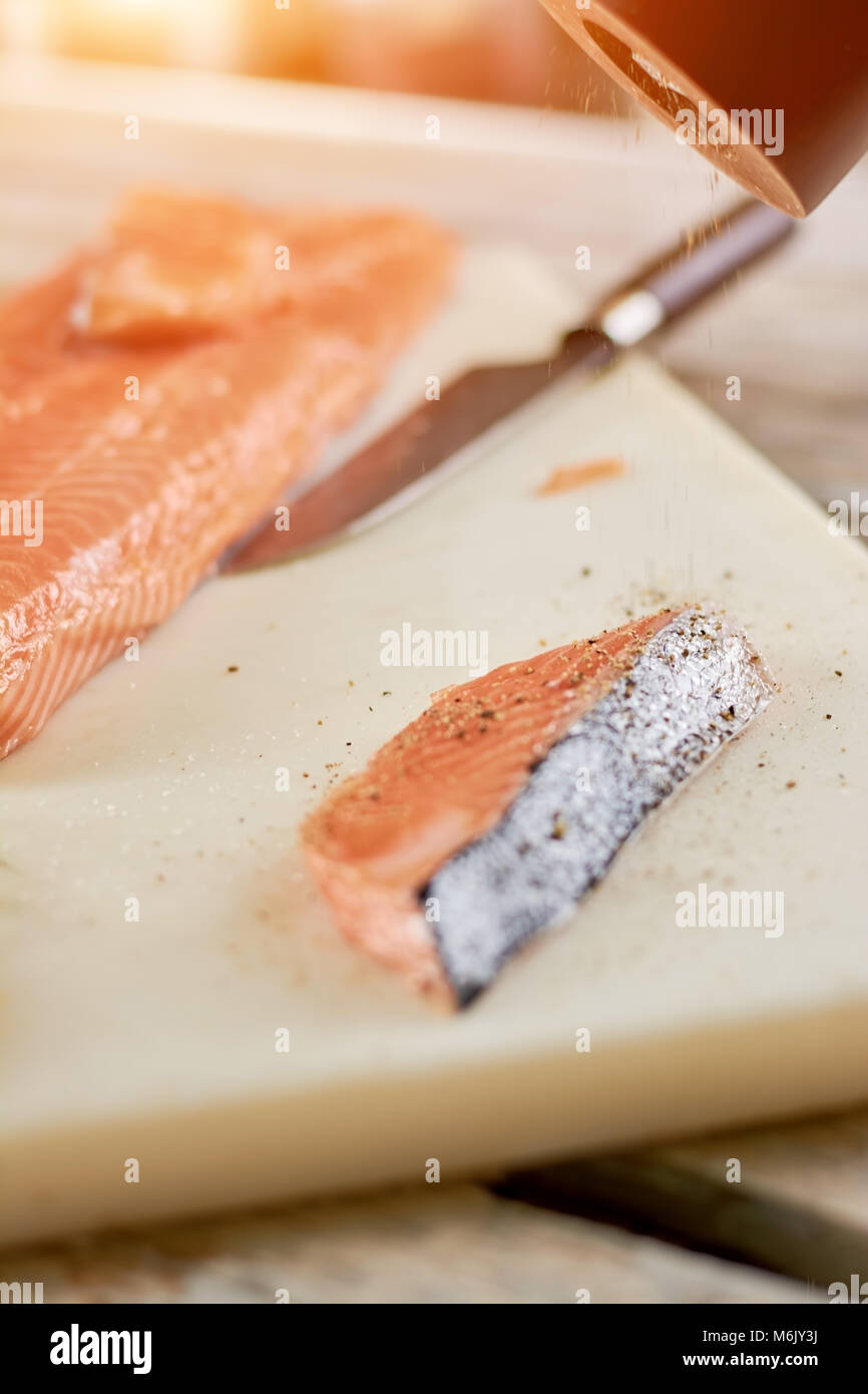 Raw salmon cooking process Stock Photo - Alamy
