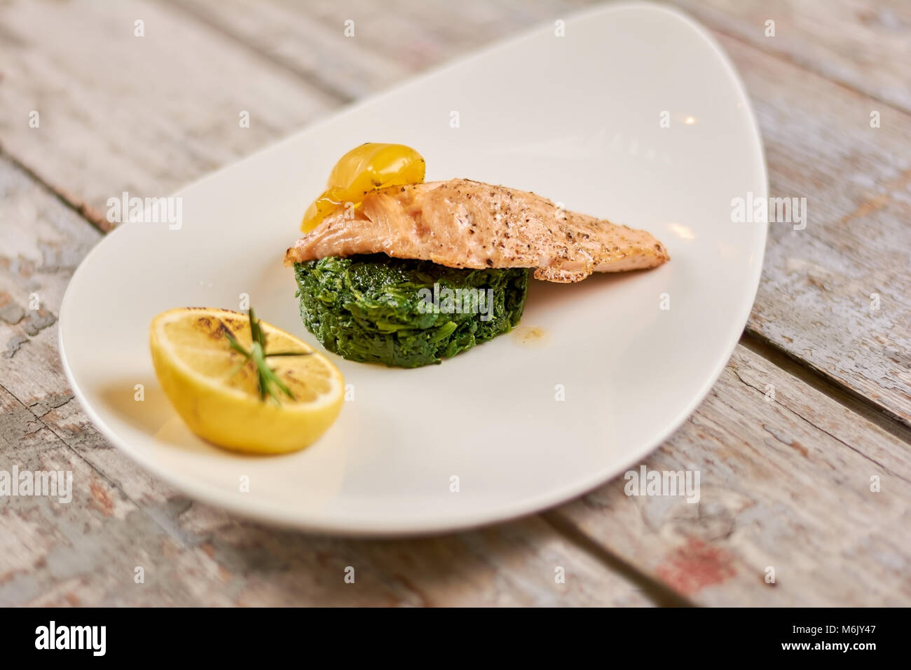 Garnishing fish hi-res stock photography and images - Alamy