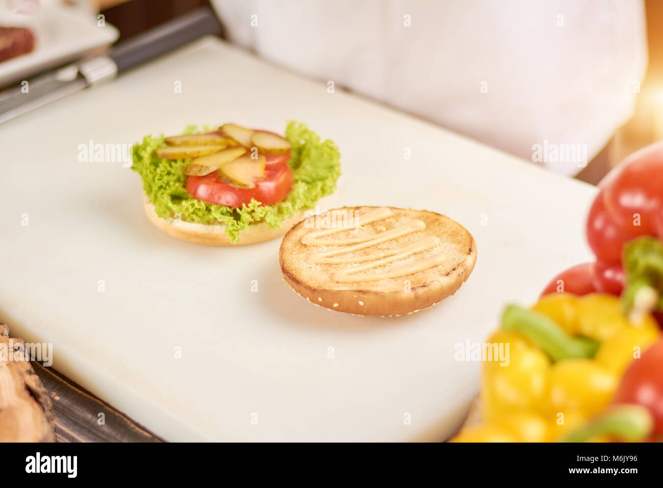 Process of burger making at kitchen Stock Photo - Alamy