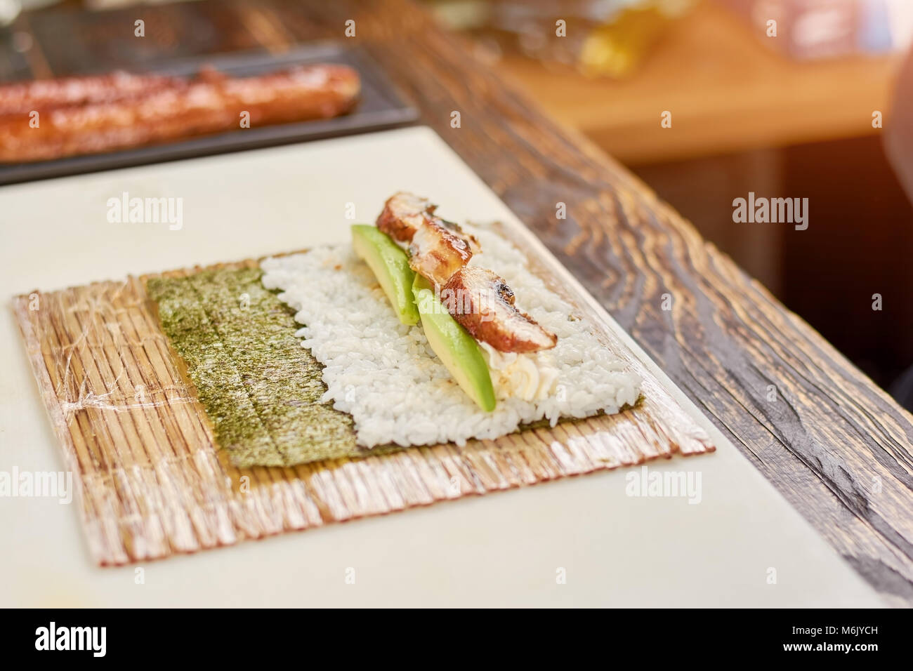The process of making sushi roll at kitchen Stock Photo - Alamy