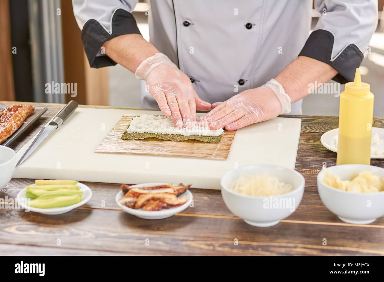 Chef hands touching white rice Stock Photo - Alamy