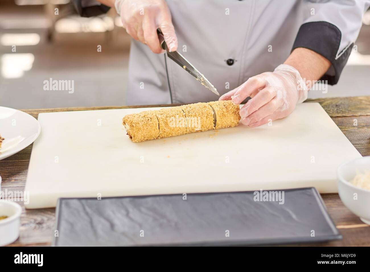 Chef cutting avocado food preparation hi-res stock photography and ...