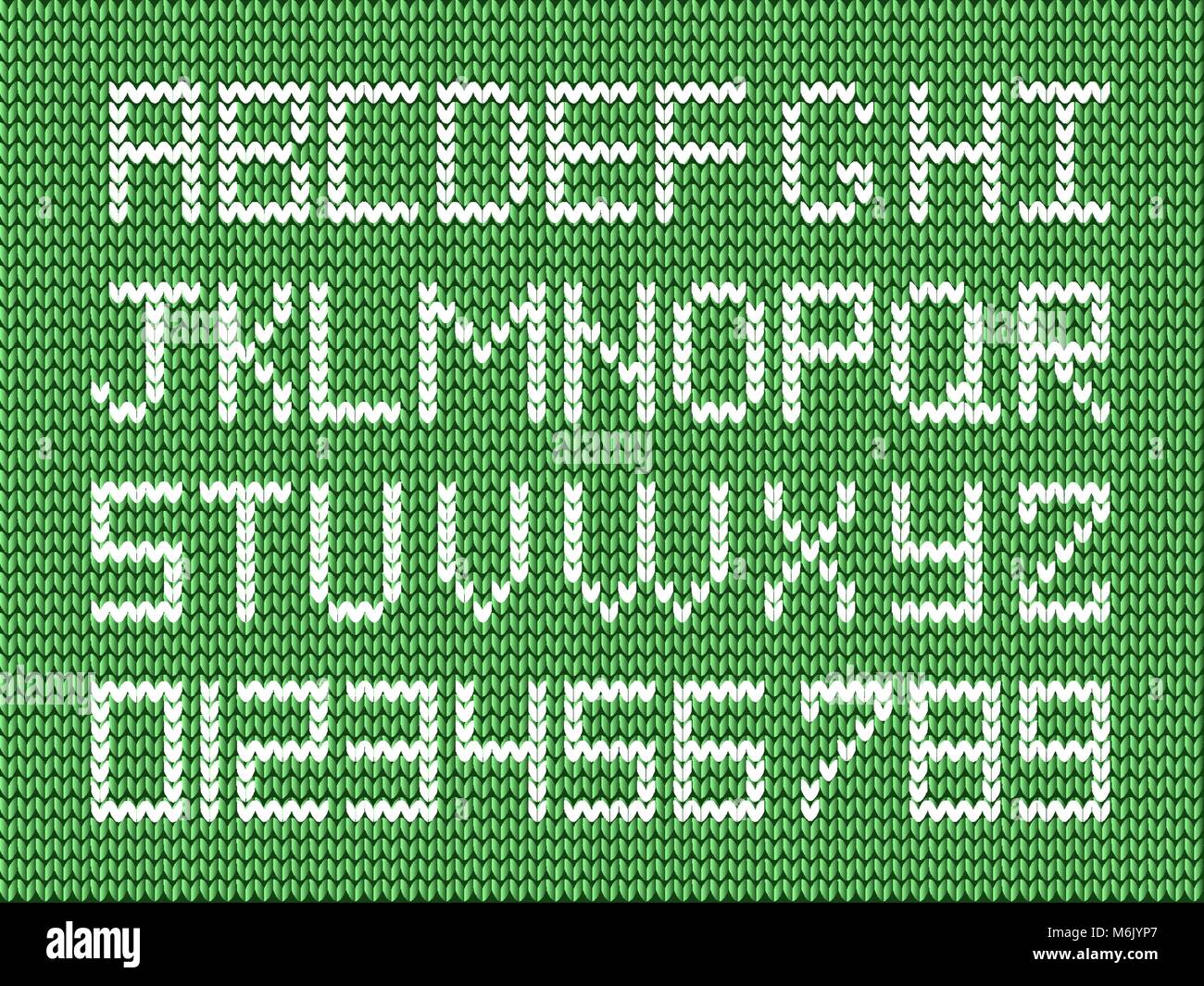 Fabric script on light green knitted background. White knitted letters ...