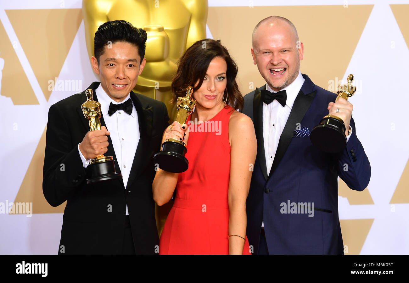 Kazuhiro Tsuji, Lucy Sibbick and David Malinowski with their award for ...