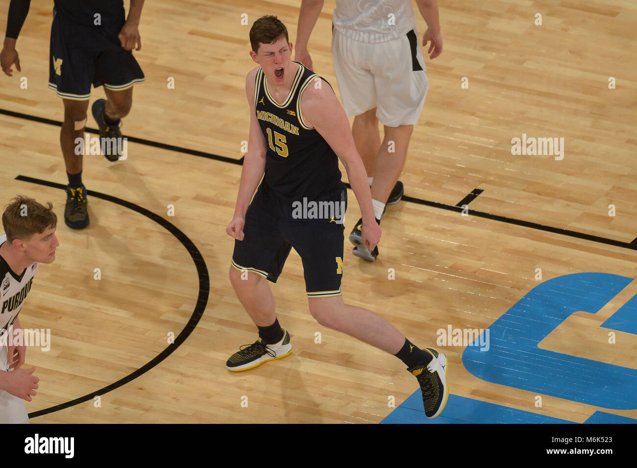 New York, New York, USA. 4th Mar, 2018. JON TESKE (15) celebrates ...