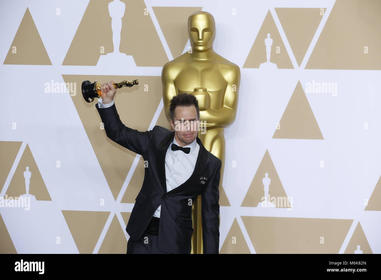 Los Angeles, USA. 4th Mar, 2018. Actor Sam Rockwell poses after winning ...