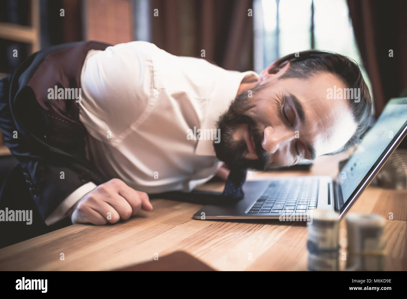 businessman in a strange position Stock Photo - Alamy