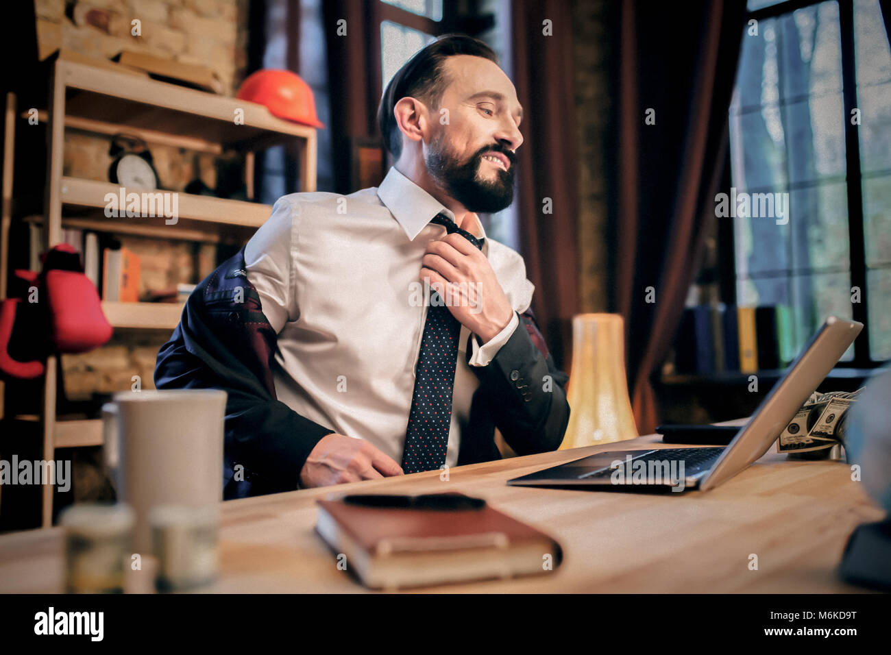 businessman in a strange position Stock Photo - Alamy