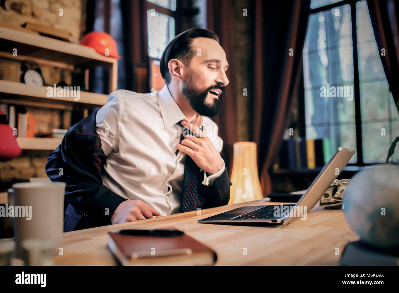 businessman in a strange position Stock Photo - Alamy