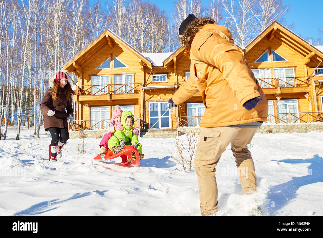 Family enjoying winter weekend Stock Photo - Alamy