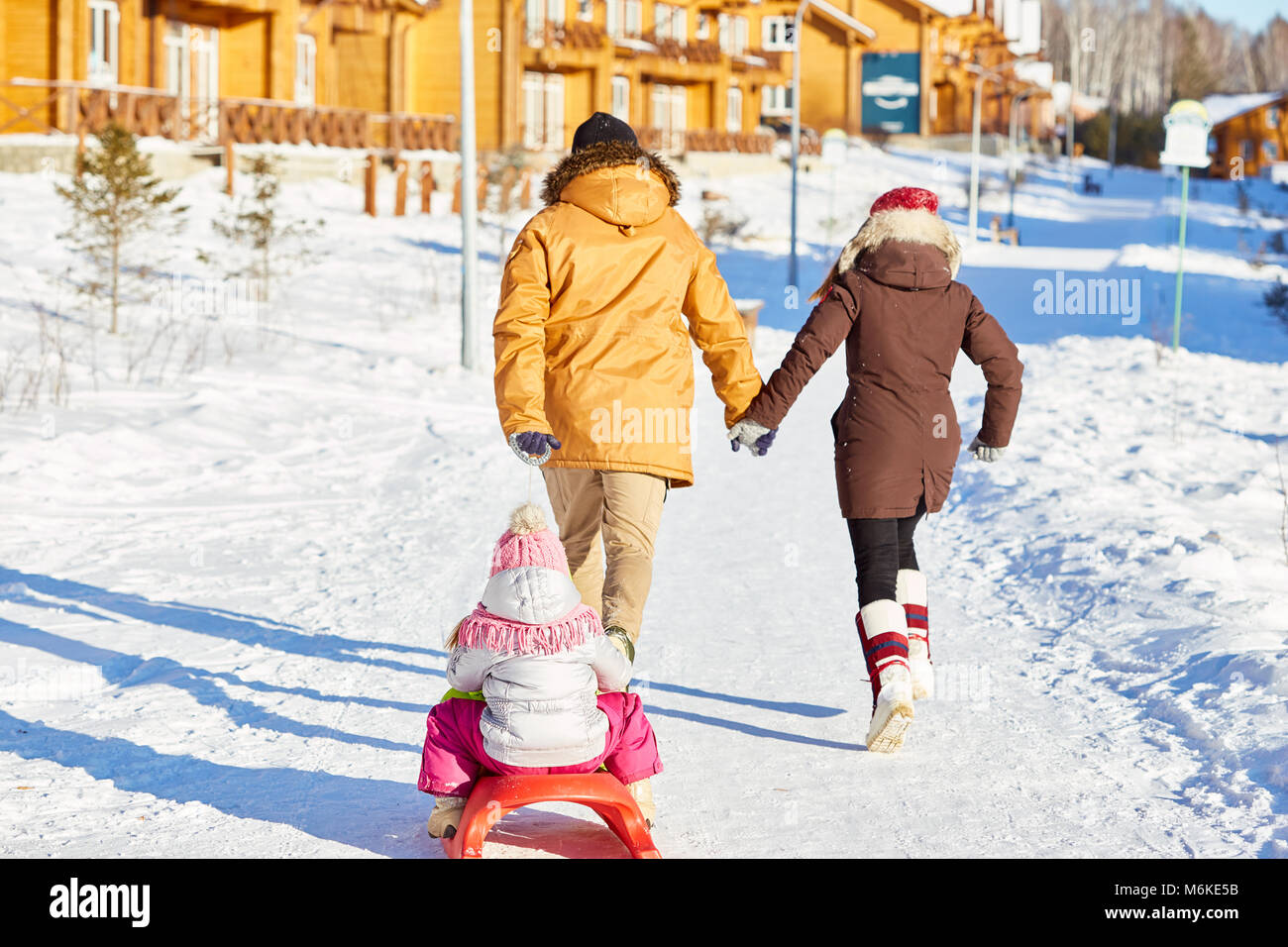 Active family on winter weekend Stock Photo - Alamy