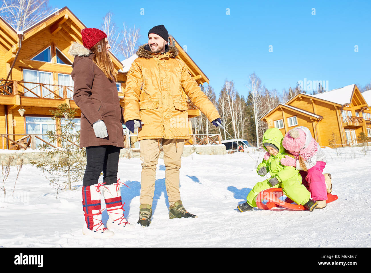 Active family on winter holidays Stock Photo - Alamy