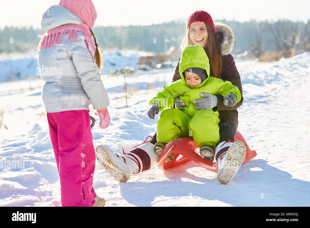 Mother having fun with kids Stock Photo - Alamy