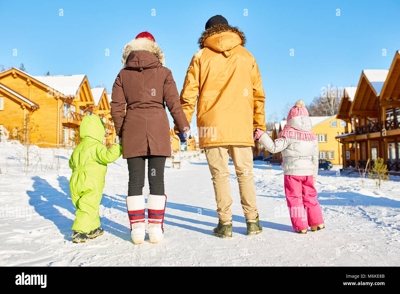 Family enjoying winter holidays Stock Photo - Alamy