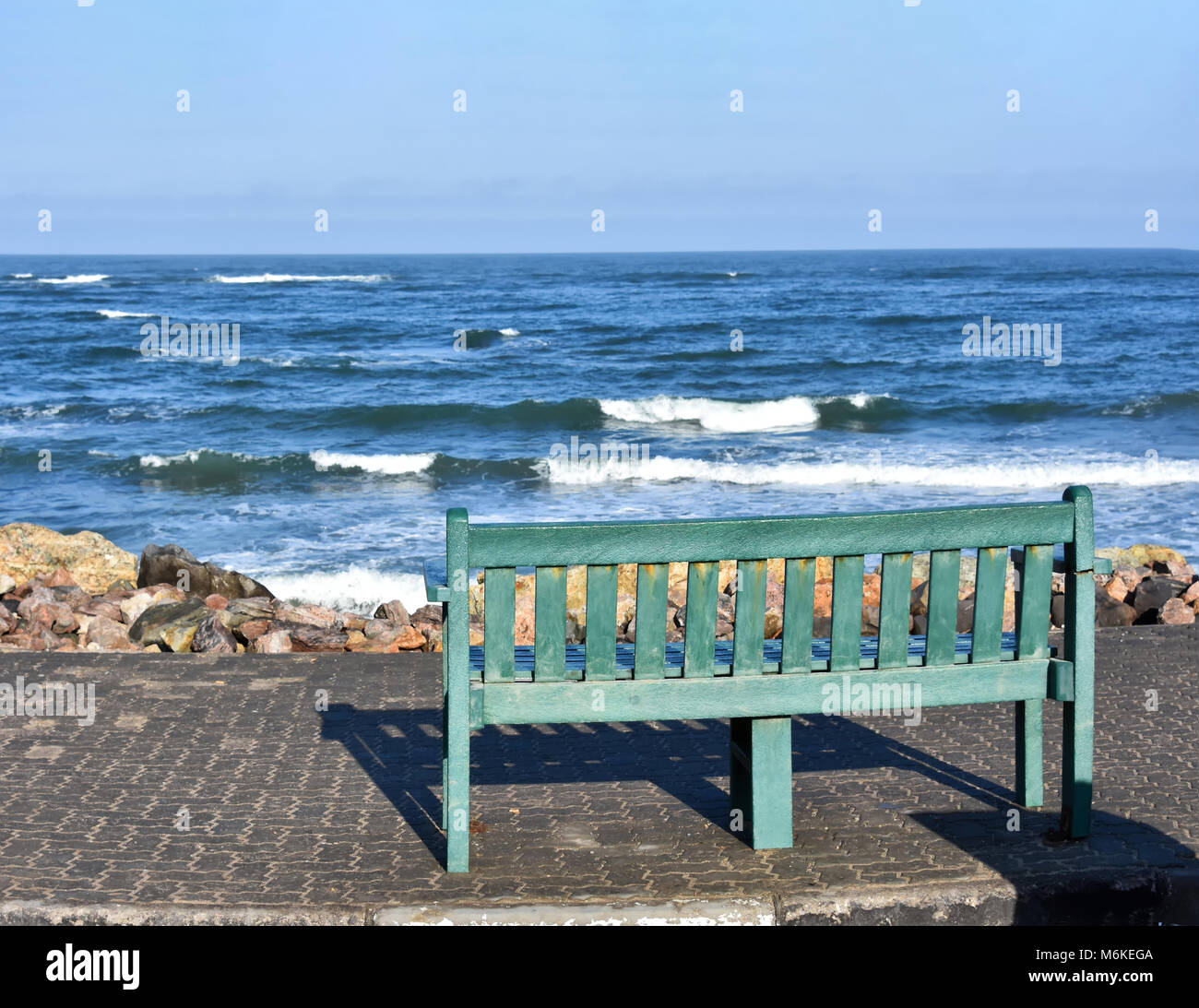 A colorful blue bench near the beach of Swakopmund Namibia Southern ...